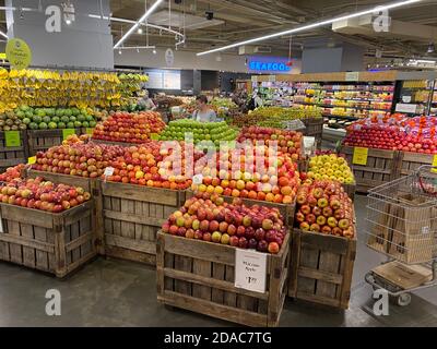 a display of fresh apples at a Whole Foods Market in the produce ...