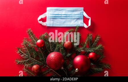 Christmas balls background and Medical protective masks. New Year 2021 ...