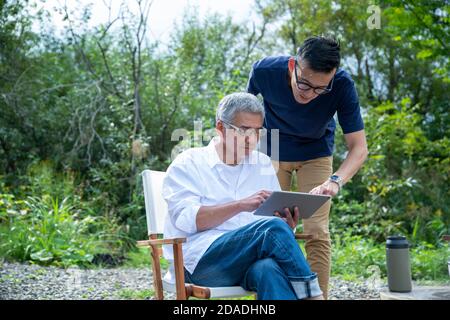 Boss and Staff Laughing Stock Photo - Alamy