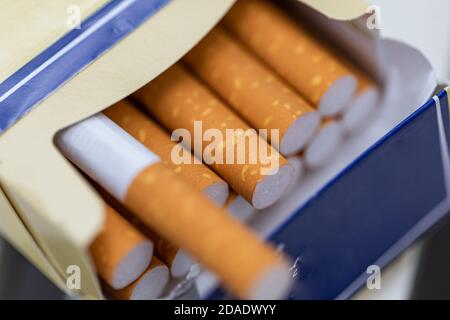 Open full pack of cigarettes isolated on white background Stock Photo ...