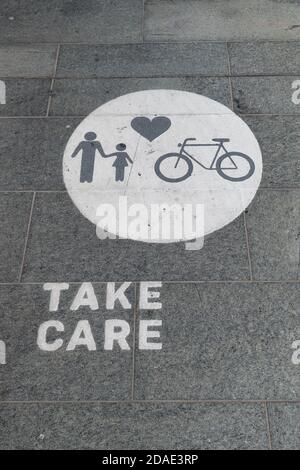 Shared use path sign for pedestrians and bicycles in an European city ...