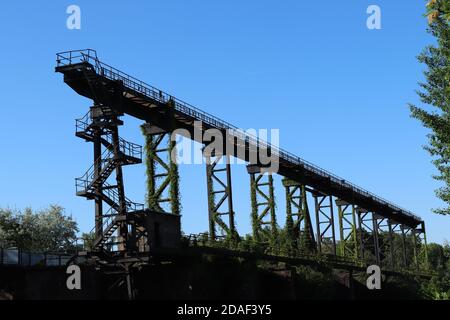 Overgrown old abandoned bridge structure Stock Photo - Alamy