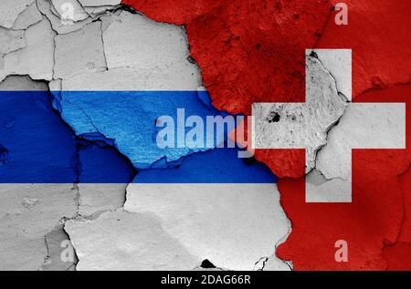 Flags of Zug canton and Switzerland painted on cracked wall Stock Photo ...
