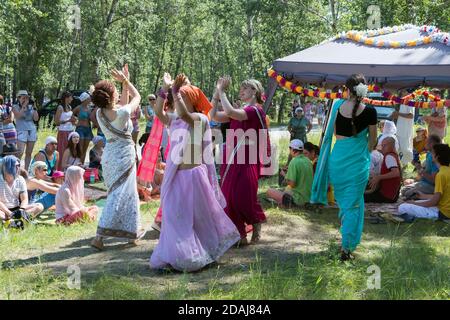 Girl dancing at summer music festival Stock Photo - Alamy