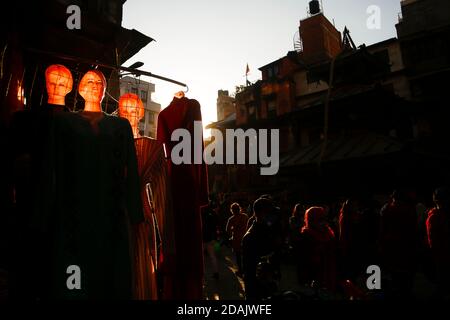 Kathmandu, Nepal. 13th Nov, 2020. Festive shoppers throng the Ason ...