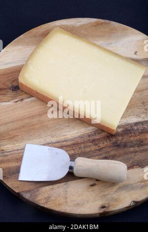 Piece of aged Comte or Gruyere de Comte, AOC French cheese made from ...