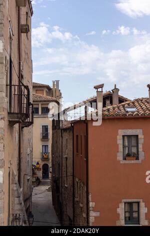 A medieval alley in the afternoon of Girona, Spain Stock Photo - Alamy