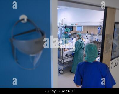 13 November 2020, Saxony, Dresden: A cardboard ambulance sticks to a ...