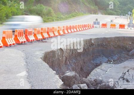 Cracked road after the disaster Stock Photo - Alamy