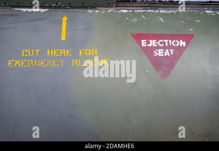 Ejection Seat sign on airplane Stock Photo - Alamy