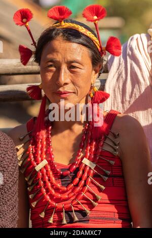 Portrait of a tribal Naga women dressed in traditional tribal attire at ...
