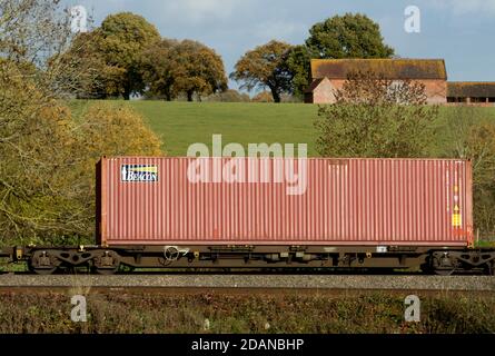 Beacon shipping container on a freightliner train, Warwickshire, UK ...