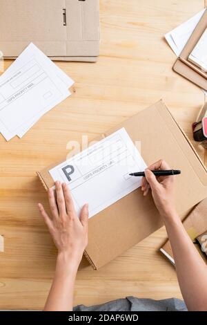 Human hand writing overview on whiteboard Stock Photo - Alamy
