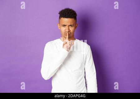 Image of disappointed and angry african-american woman, telling no ...