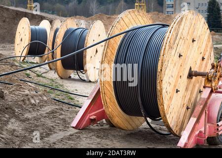 The high voltage electrical cable is laid in a trench Stock Photo - Alamy