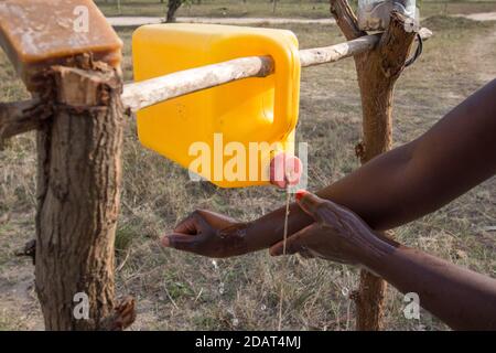 Hand washing innovation called tippy tap made of 5 liter can of water ...