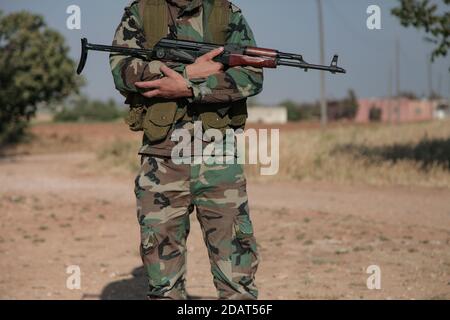 North Homs, Syria - 2017: Soldier Fighter Standing while Holding and ...