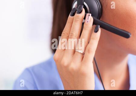 Portrait of medical secretary typing report Stock Photo - Alamy