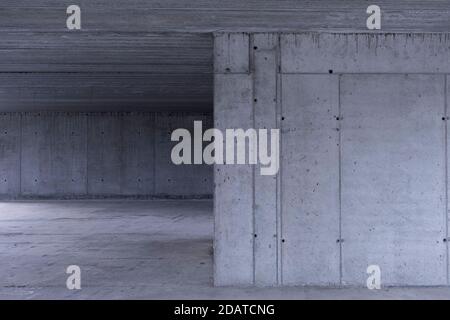 Empty room in a house under construction, plastered walls, screed on ...