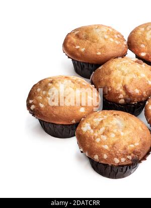 Chocolate muffin cross section isolated on white. Paper and crumbs in ...
