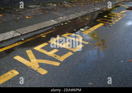 A 'Keep Clear' road marking seen on a road in London Stock Photo - Alamy