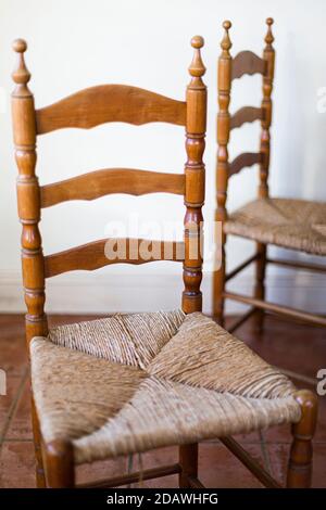 wooden and straw Súgán Irish chairs in kitchen Stock Photo - Alamy