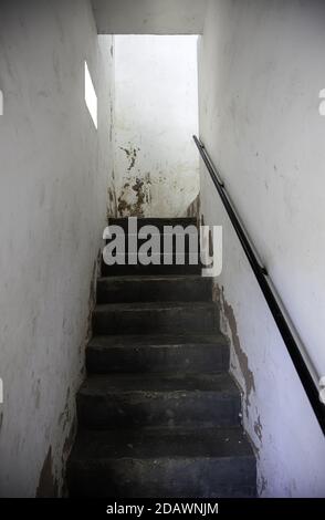 Texture of medieval stone wall and old metal door. Old castle stone ...