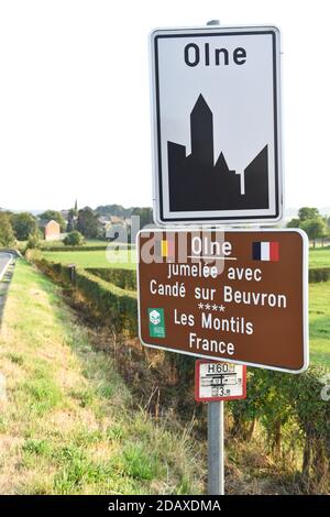 Illustration shows the name of the Olne municipality on a road sign ...
