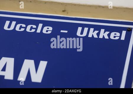 Illustration shows the name of the Uccle Ukkel municipality on a road ...