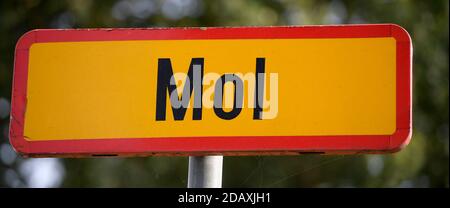 Illustration shows the name of the Mol municipality on a road sign ...
