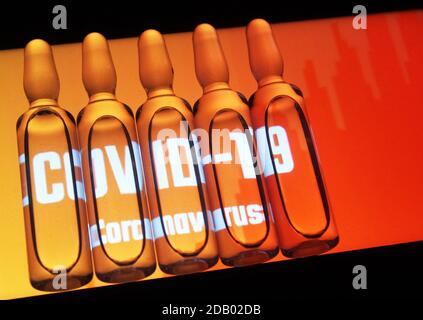 In this photo illustration, ampules with fake covid-19 vaccine. (Photo ...