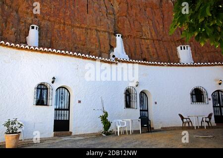 Barrio de las Cuevas - Cave houses district. Highlighting the church of ...