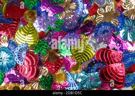 Multicolor sequins of different shapes Stock Photo - Alamy