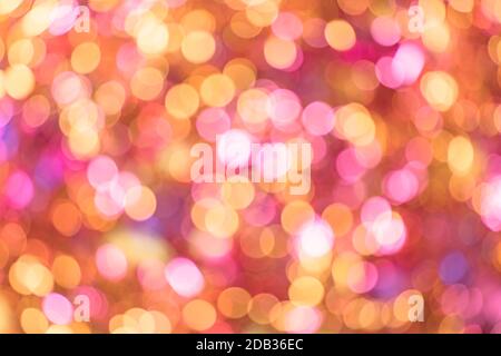 Background texture full of unsharp golden and pink shining bokeh ...