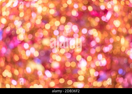 Background texture full of unsharp golden and pink shining bokeh ...