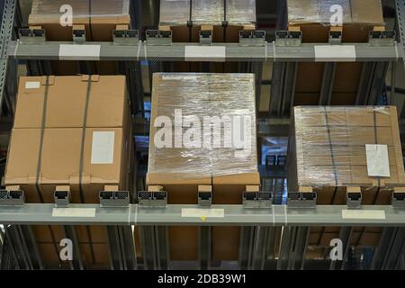 Warehouse shelves loaded up with bulk boxes Stock Photo - Alamy