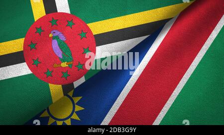 Namibia and Dominica two flags textile cloth, fabric texture Stock ...