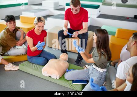 Caucasian man giving woman CPR Stock Photo - Alamy
