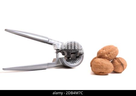 View of a metal tool for cracking nuts isolated on a white background ...