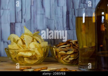 Cold beer snacks and potato chips Stock Photo - Alamy