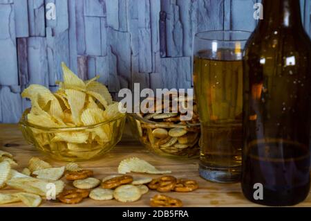 Cold beer snacks and potato chips Stock Photo - Alamy