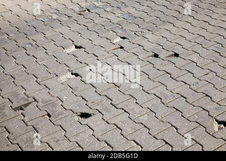 pedestrian tiles broken Stock Photo - Alamy