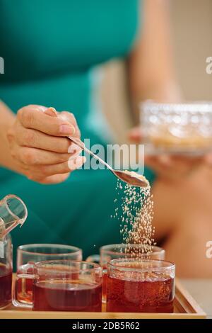 Vietnamese woman pouring tea in a tea shop in Hoi An, Vietnam Stock ...