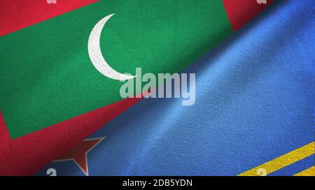 Aruba and Maldives two flags textile cloth, fabric texture Stock Photo ...