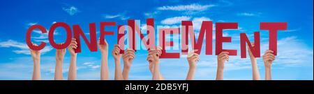 People Hands Holding Word Confinement Means Self-Isolation, Blue Sky ...