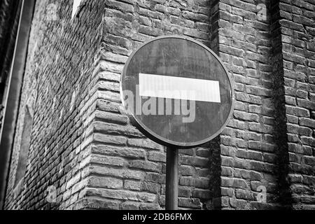 Trespassing sign in the city, detail of a signal and traffic ...
