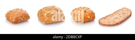 Wholemeal rolls and bread in a row white isolated Stock Photo - Alamy