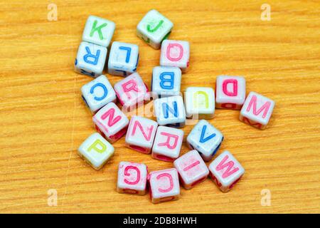 Multi color educational letters dice set for kids Stock Photo - Alamy