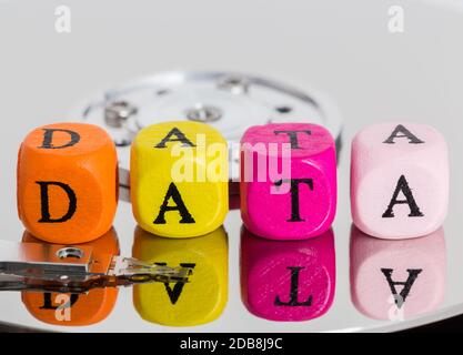 Data letter cube on hard disk concept Stock Photo - Alamy