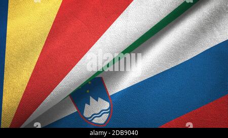 Slovenia and Seychelles two flags textile cloth, fabric texture Stock ...